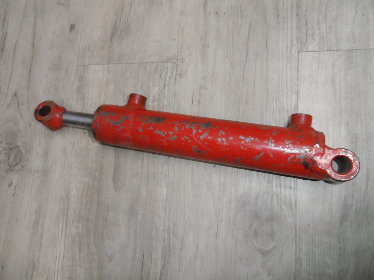 PISTÓN HIDRAULICO DE DOBLE EFECTO COLOR ROJO - Oller Stocks