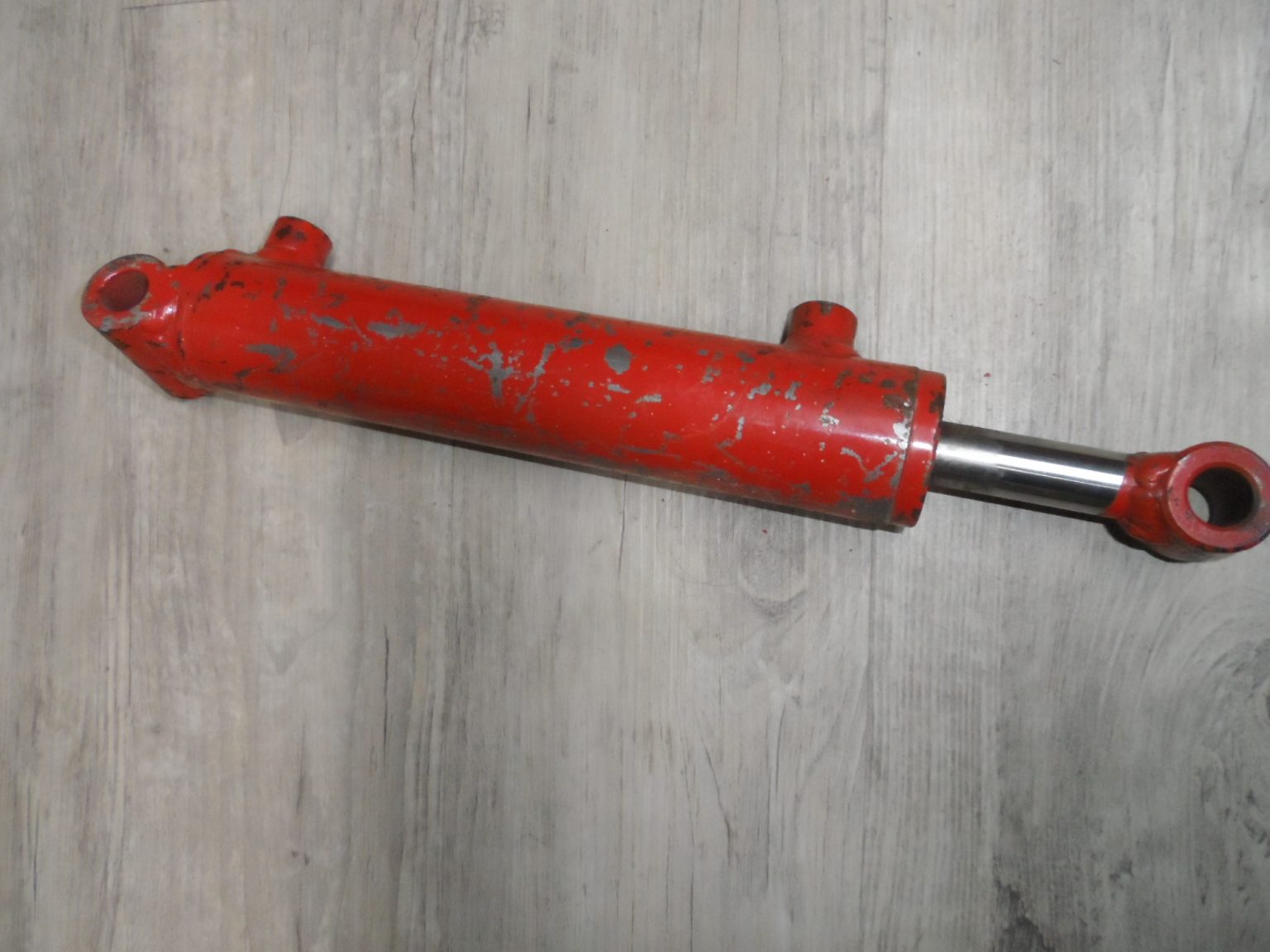 PISTÓN HIDRAULICO DE DOBLE EFECTO COLOR ROJO - Oller Stocks